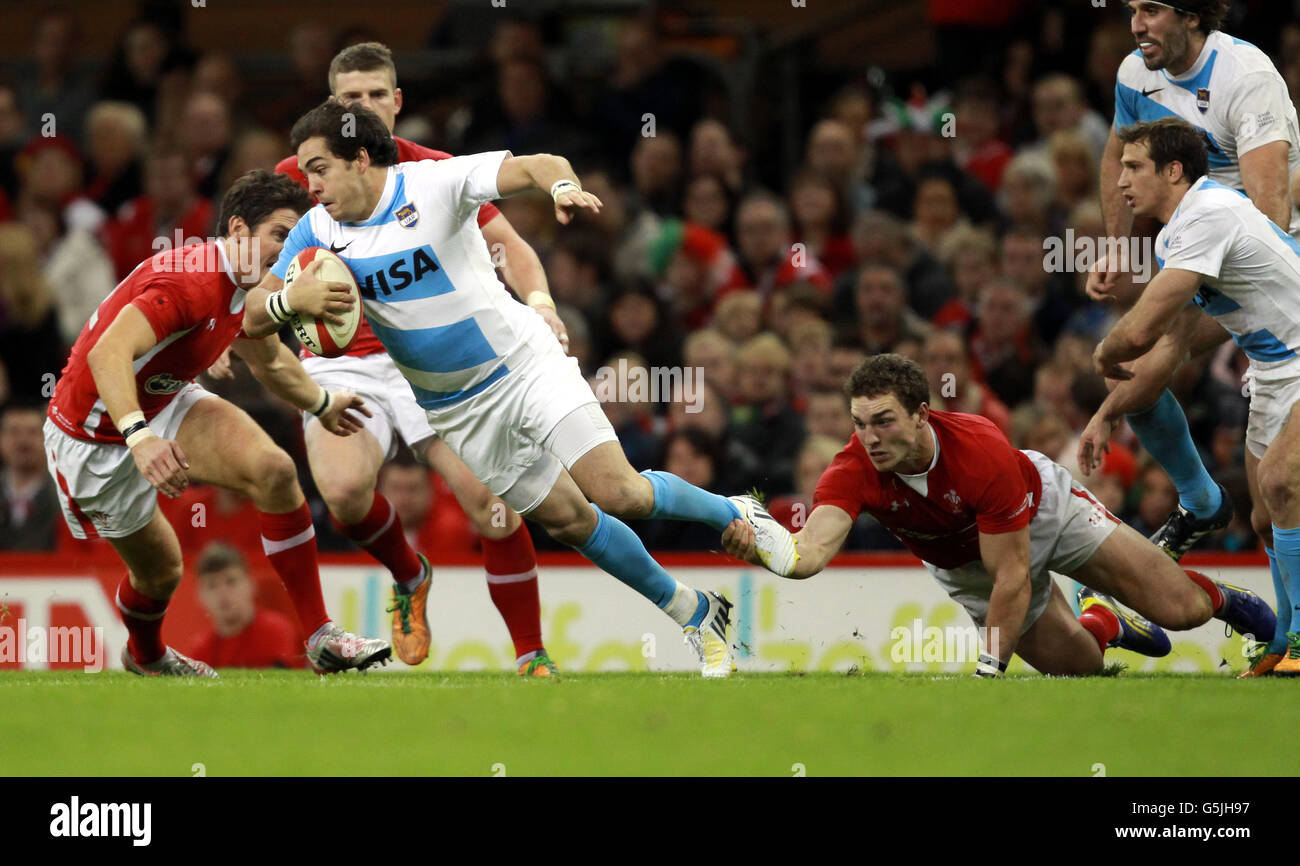 Argentina's Horacio Agulla is caught by Wales' George North during the ...
