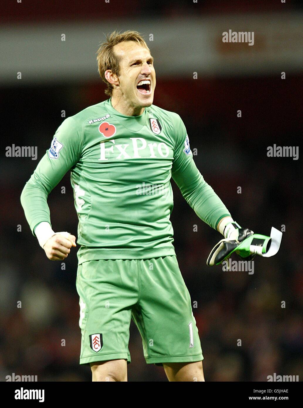 Fulham goalkeeper Mark Schwarzer celebrates at the end of the match ...