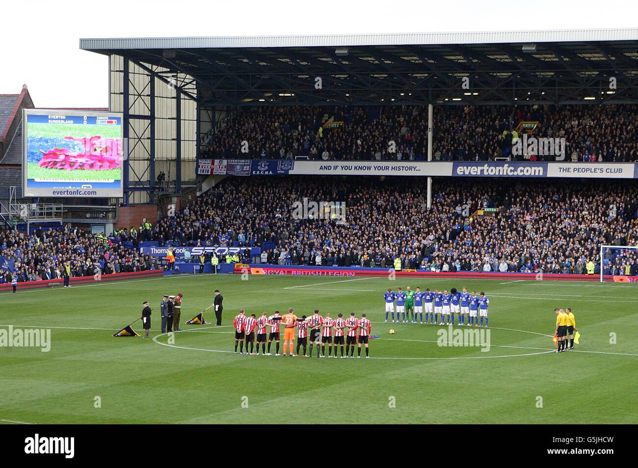 A general view of the two teams observing a minute's silence in honour ...