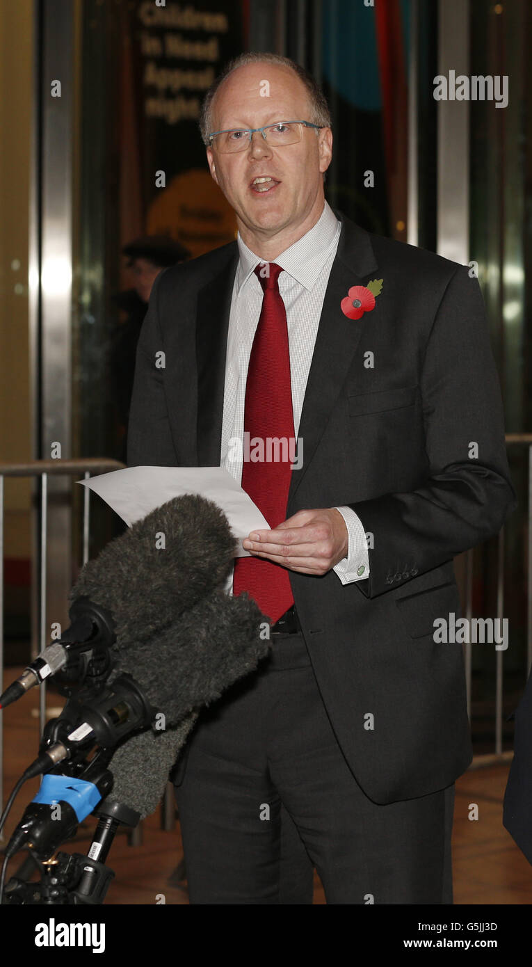 Bbc director general george entwistle stands outside bbc broadcasting ...