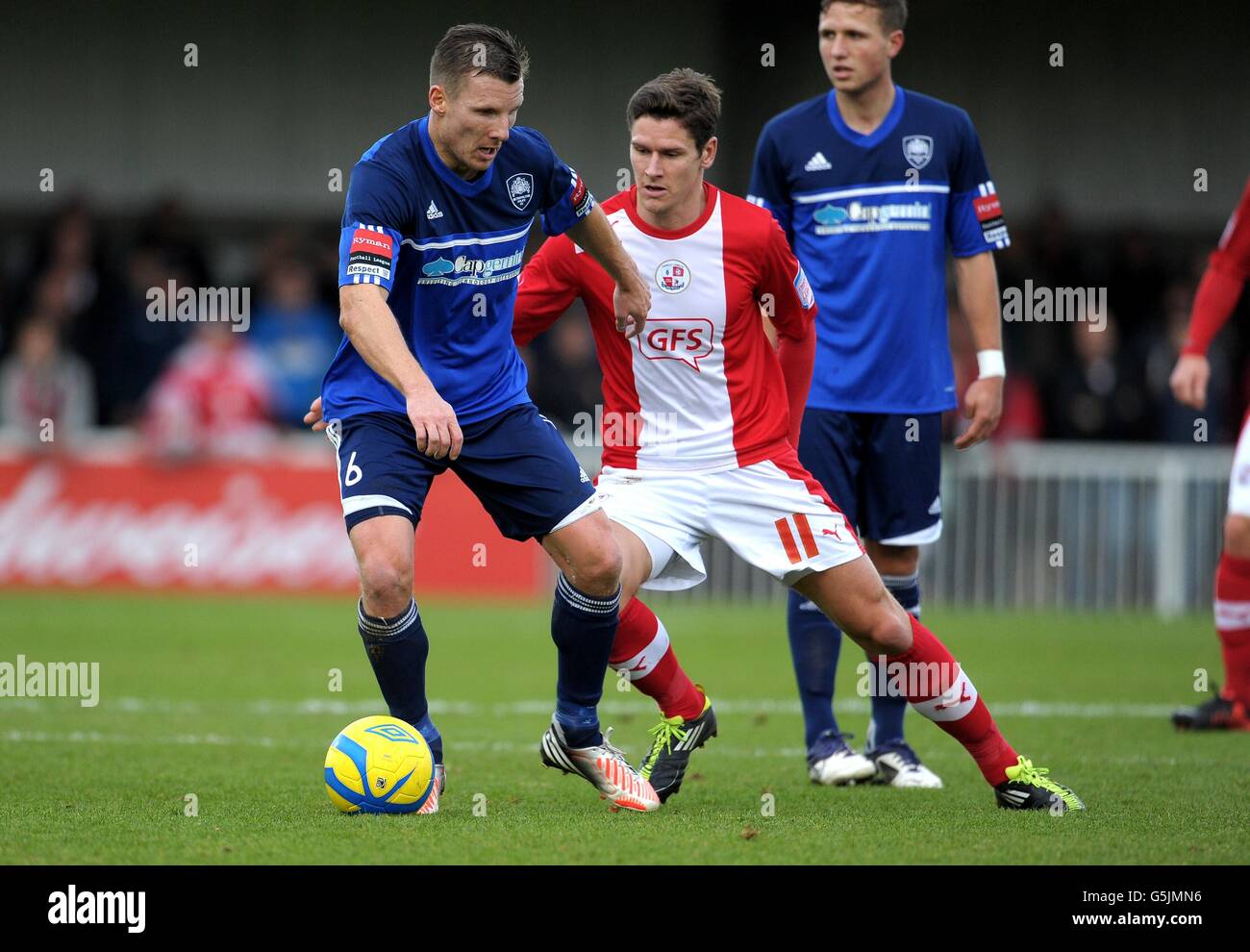 Metropolitan Police's Matt Smart and Crawley Town's Josh Simpson during ...