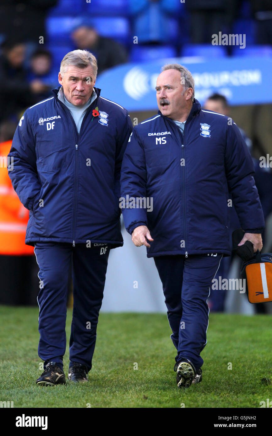 Birmingham City club doctor Mike Stone (right) talks to first team ...