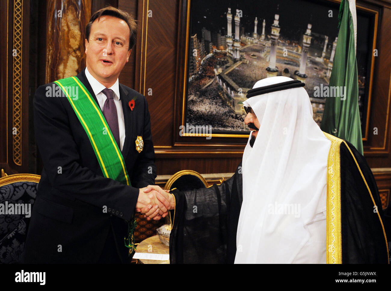 Prime Minister David Cameron receives the King Abdullah Decoration One ...