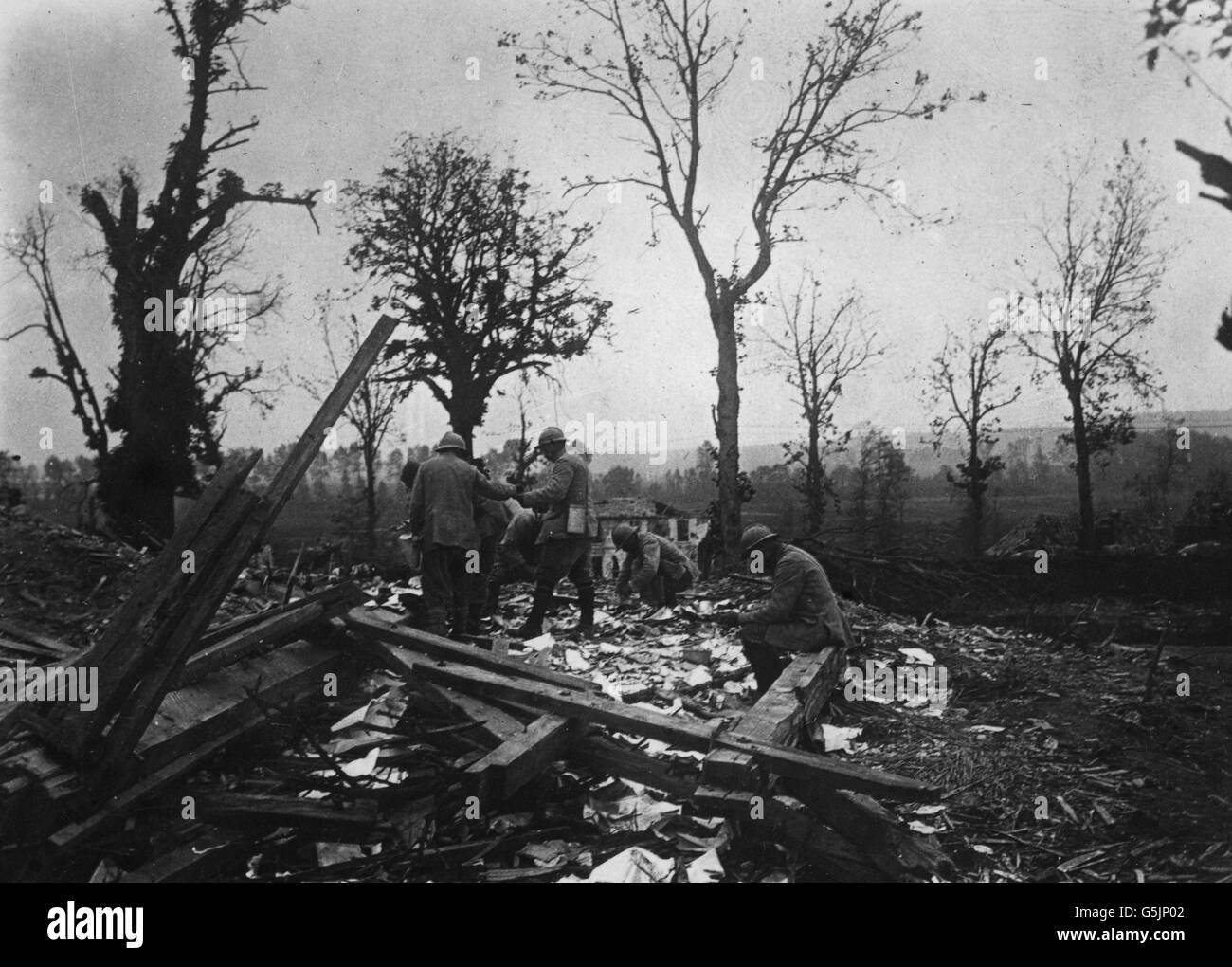 French soldiers collecting title deeds and official documents from ...