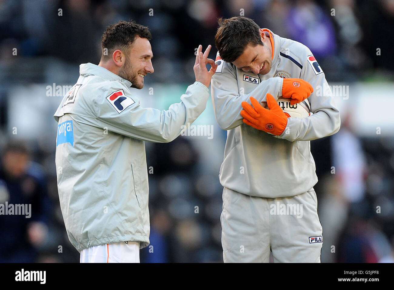 Blackpool's Neal Easadly (let) and team-mart Chris Basham during ...