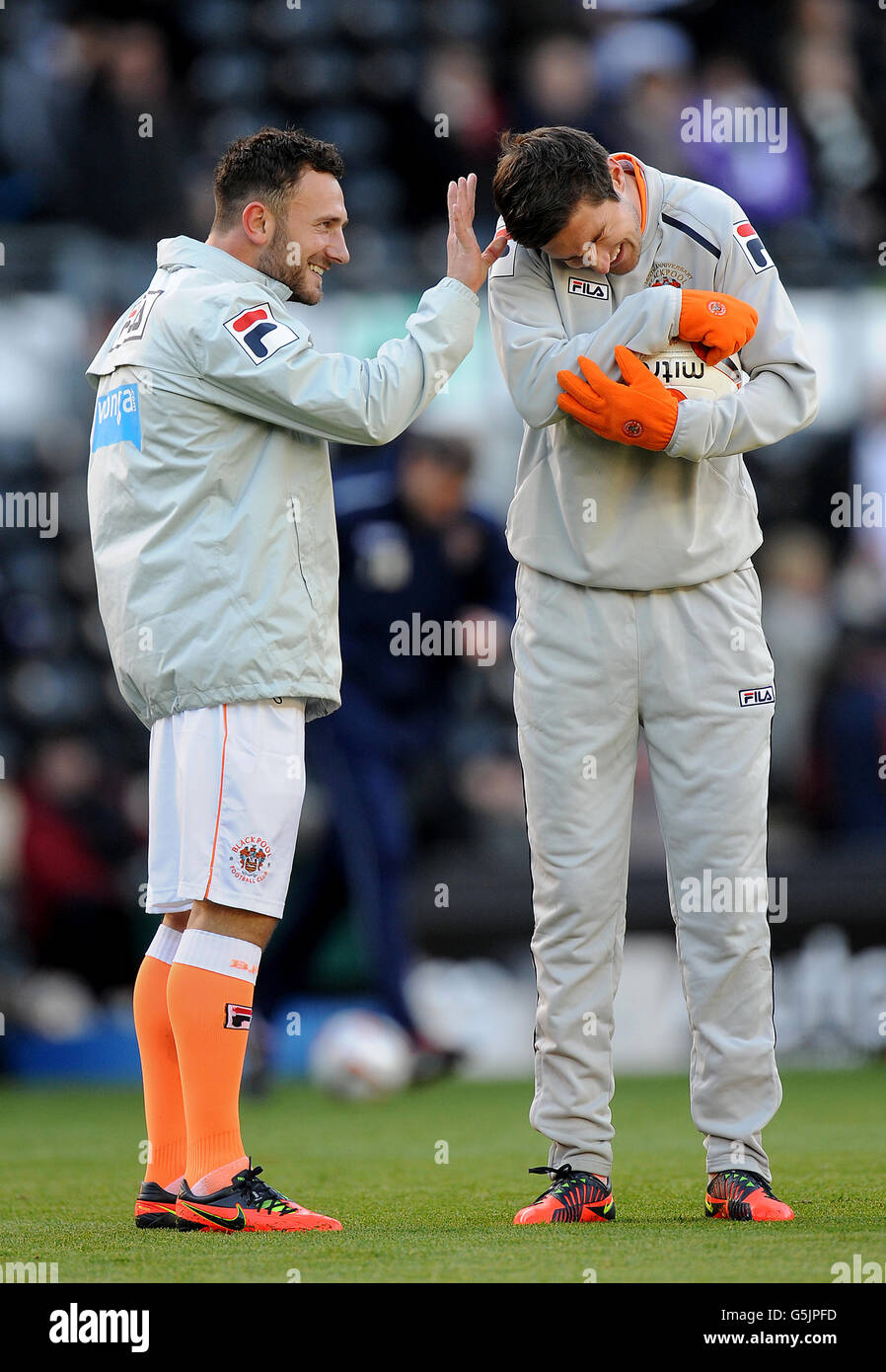 Blackpool's Neal Easadly (let) and team-mart Chris Basham during ...