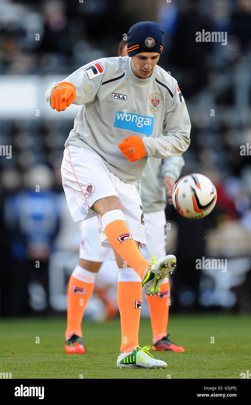 Blackpool's Neal Easadly (let) and team-mart Chris Basham during ...
