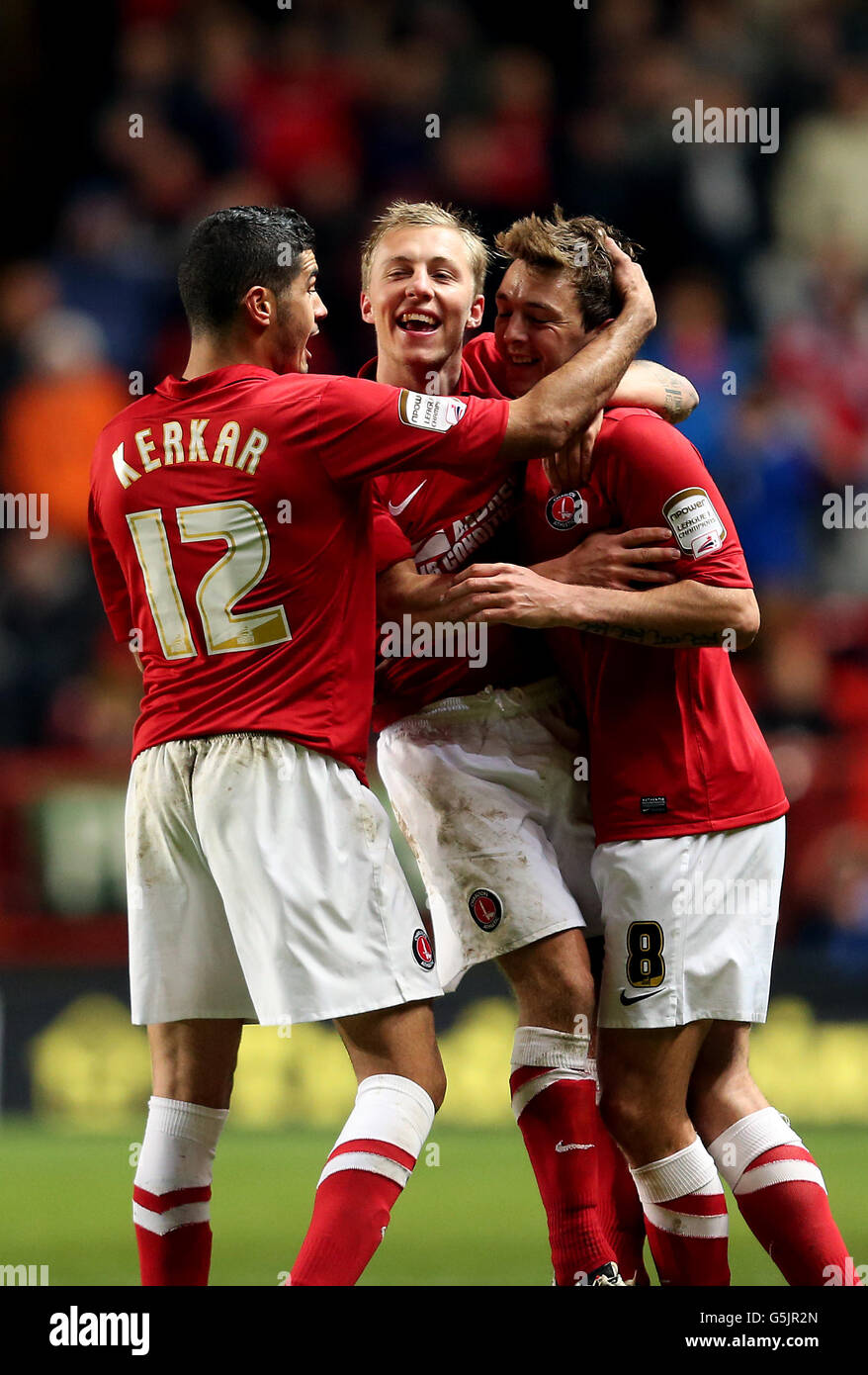 Charlton Athletic's Dale Stephens (right) is mobbed after scoring his ...