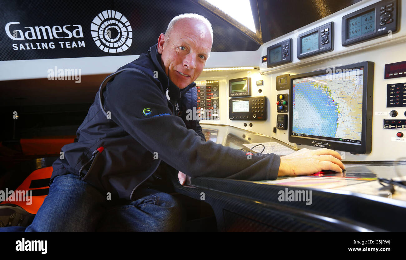 British yachtsman Mike Golding poses for photos on his racing yacht ...