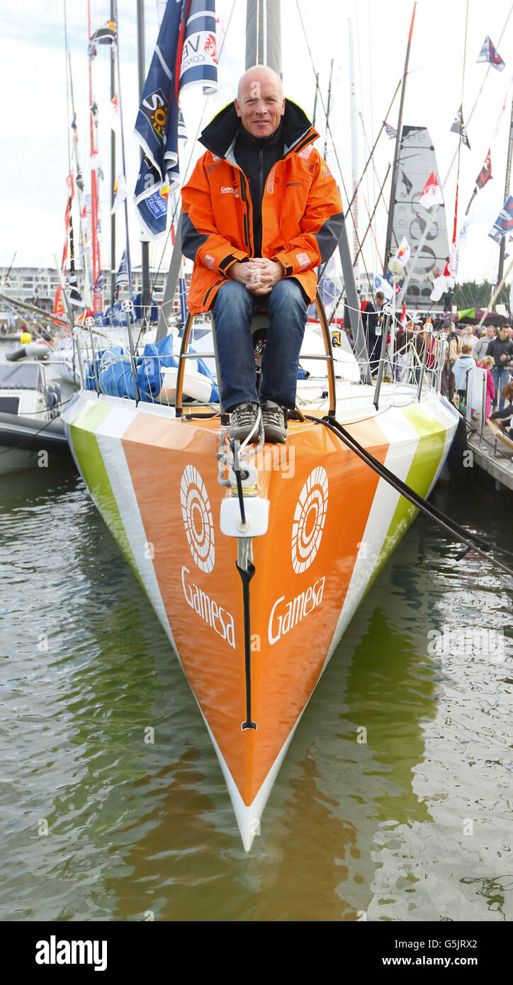British yachtsman Mike Golding poses for photos on his racing yacht ...