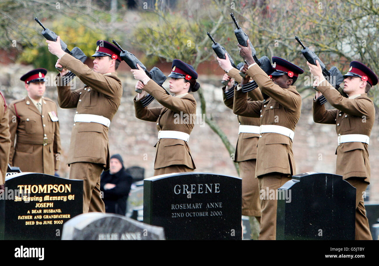 Coporal Channing Day's colleagues fire a volley of shots as she is laid ...