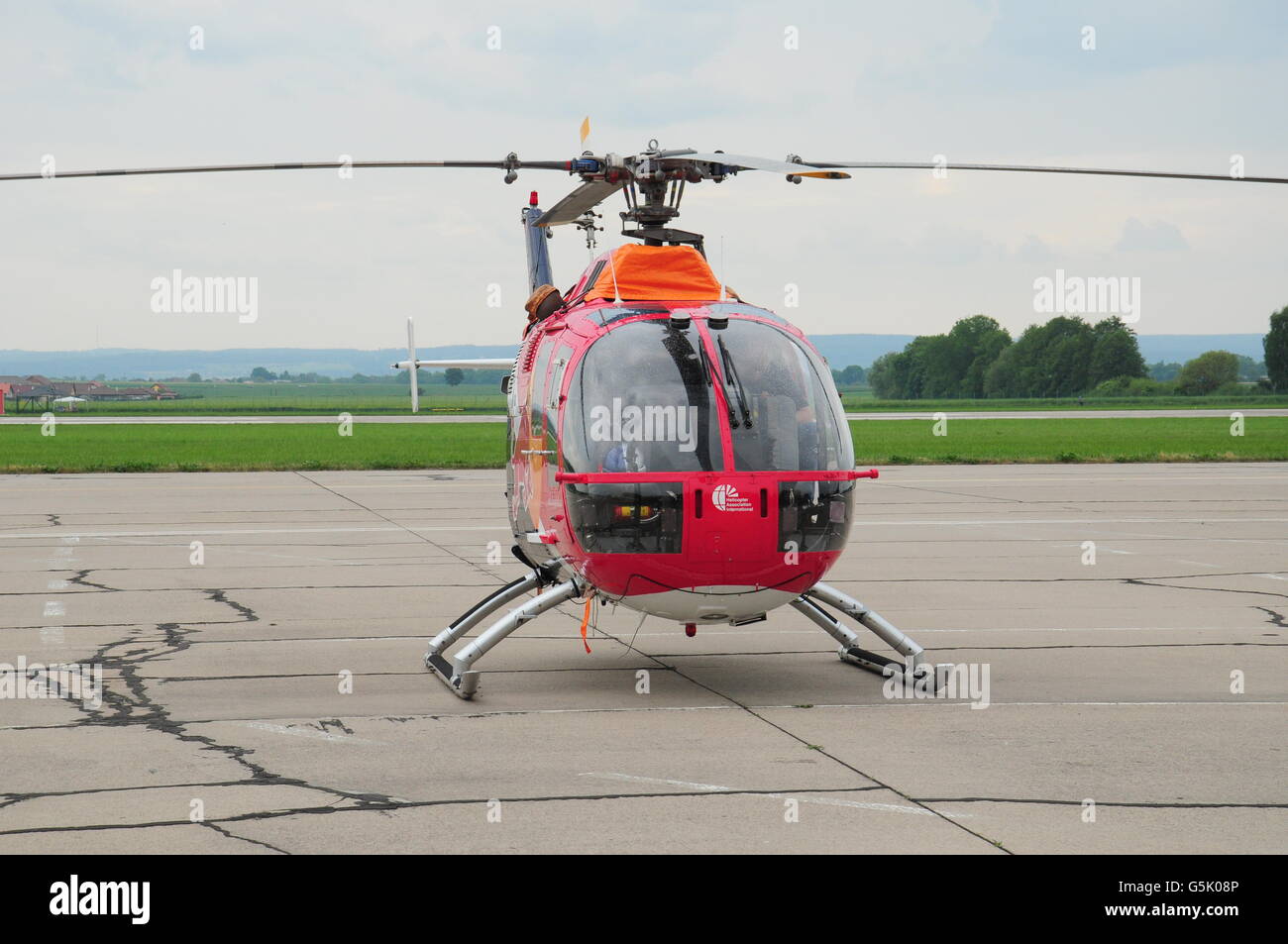 Acrobatic helicopter at the airport in Pardubice, helicopter BO-105 ...