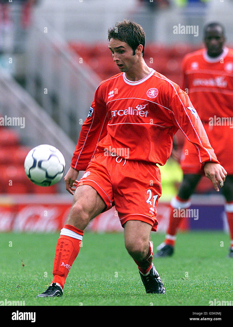 Sport football action arms to side ball hi-res stock photography and ...