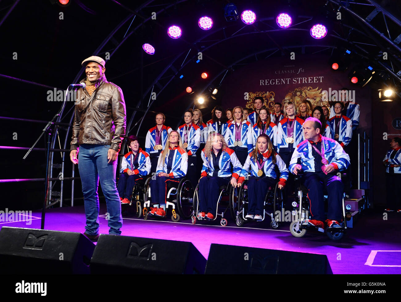 Noah Stewart performs in front of members of the Olympic and Paralympic ...