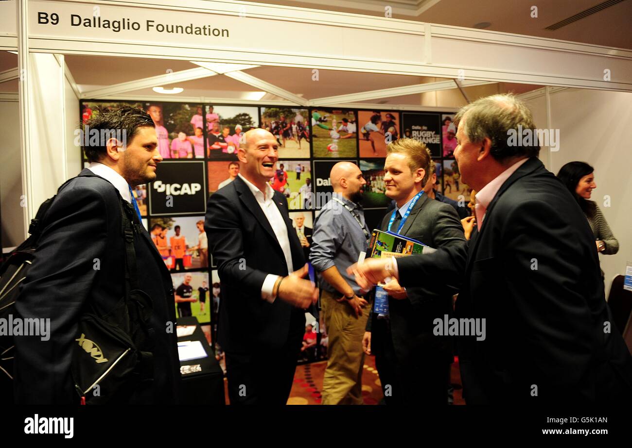 Former England captain Lawrence Dallaglio (second left) greets ...