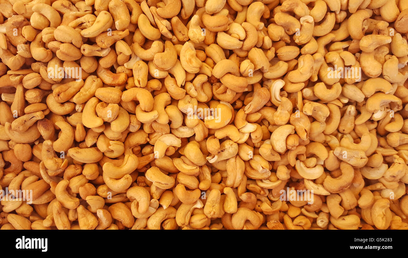 Background of ripe roasted cashew Stock Photo - Alamy