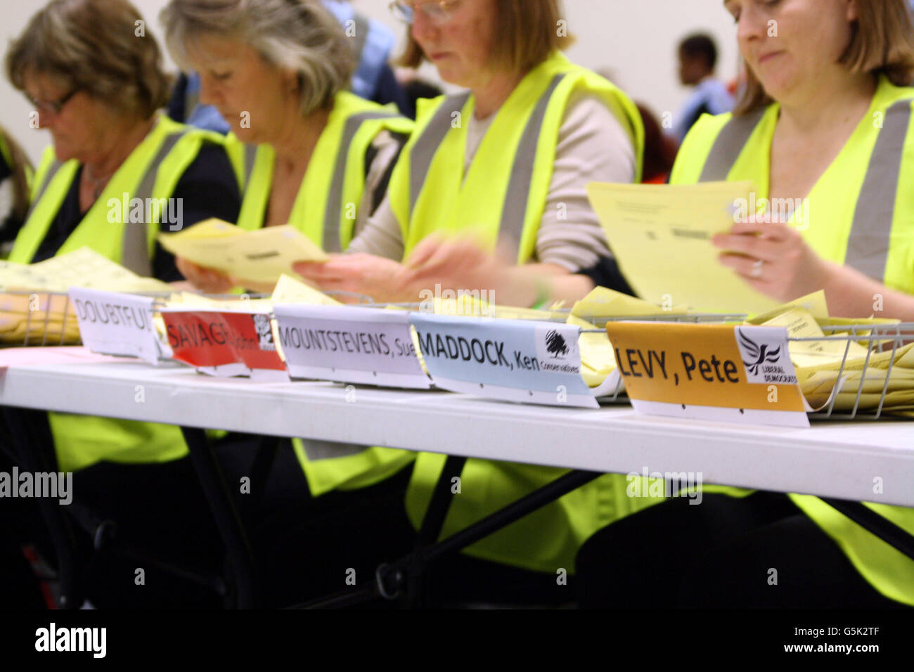 Counting agents sort through ballot papers for the election of the ...