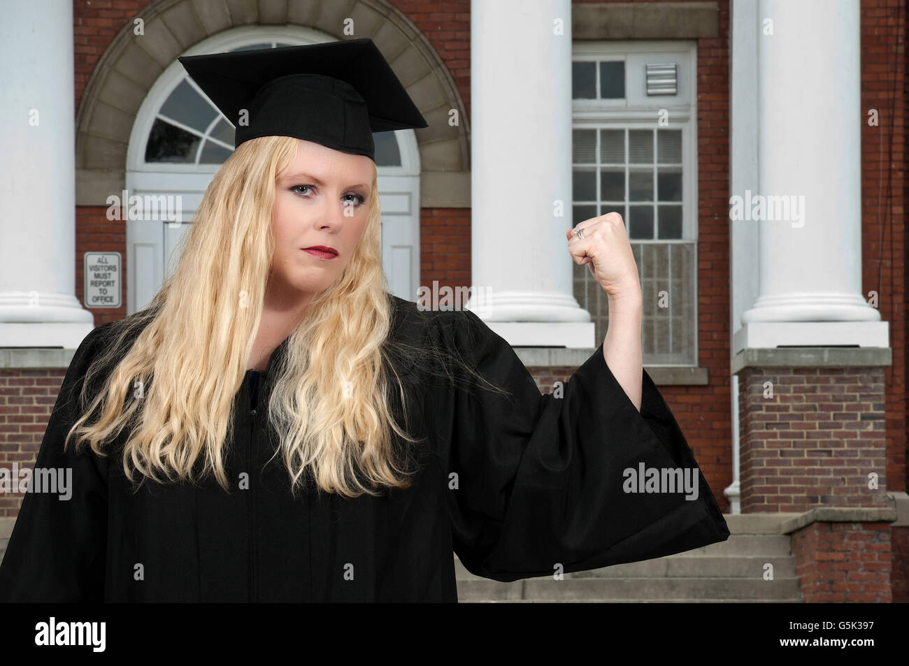 Young woman in her graduation robes Stock Photo - Alamy