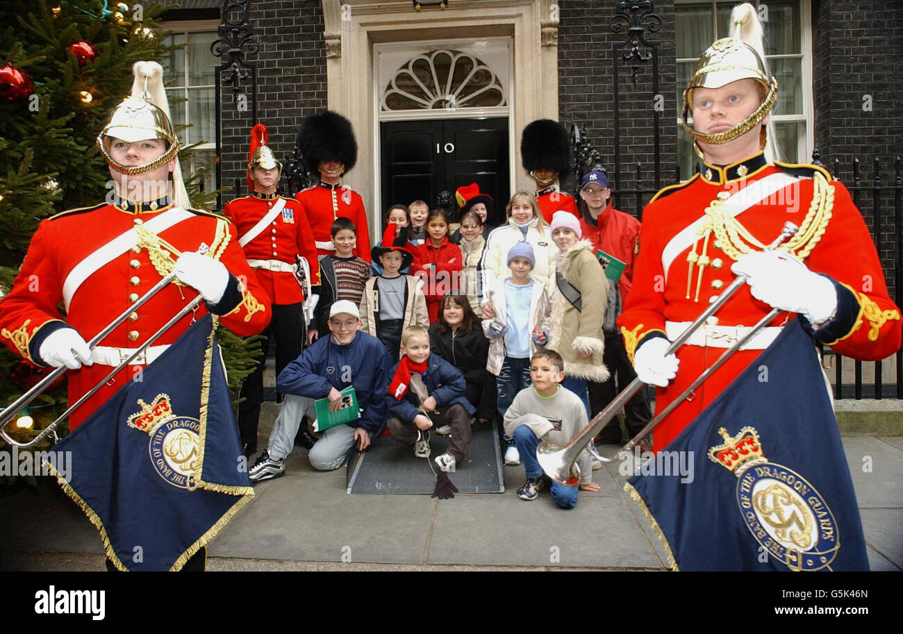 A pair of Dragoon Guards trumpeters pose for a photograph outside No.10 ...