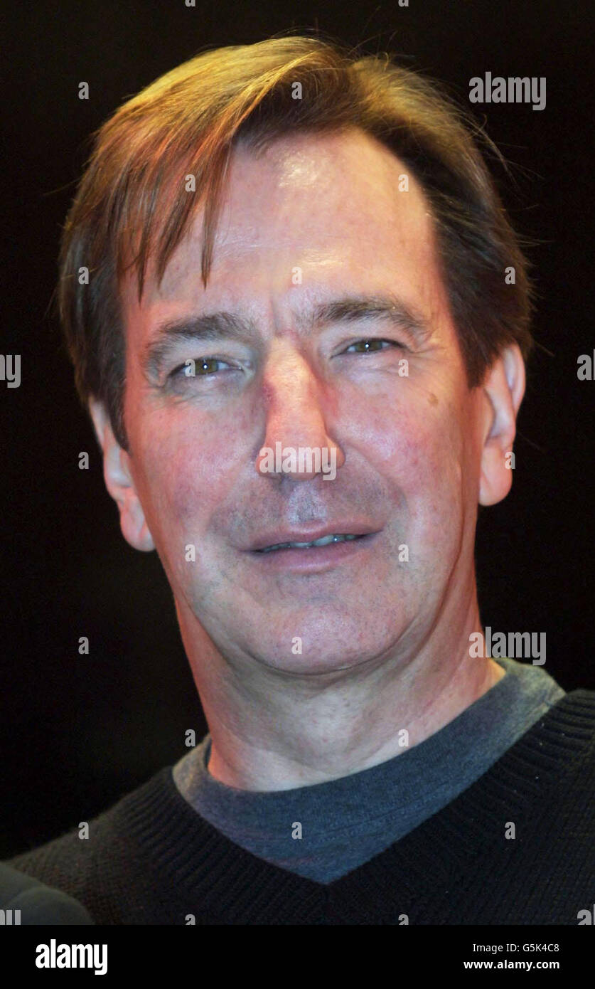 Alan Rickman, who stars in Voices of Exile, poses for pictures during a ...