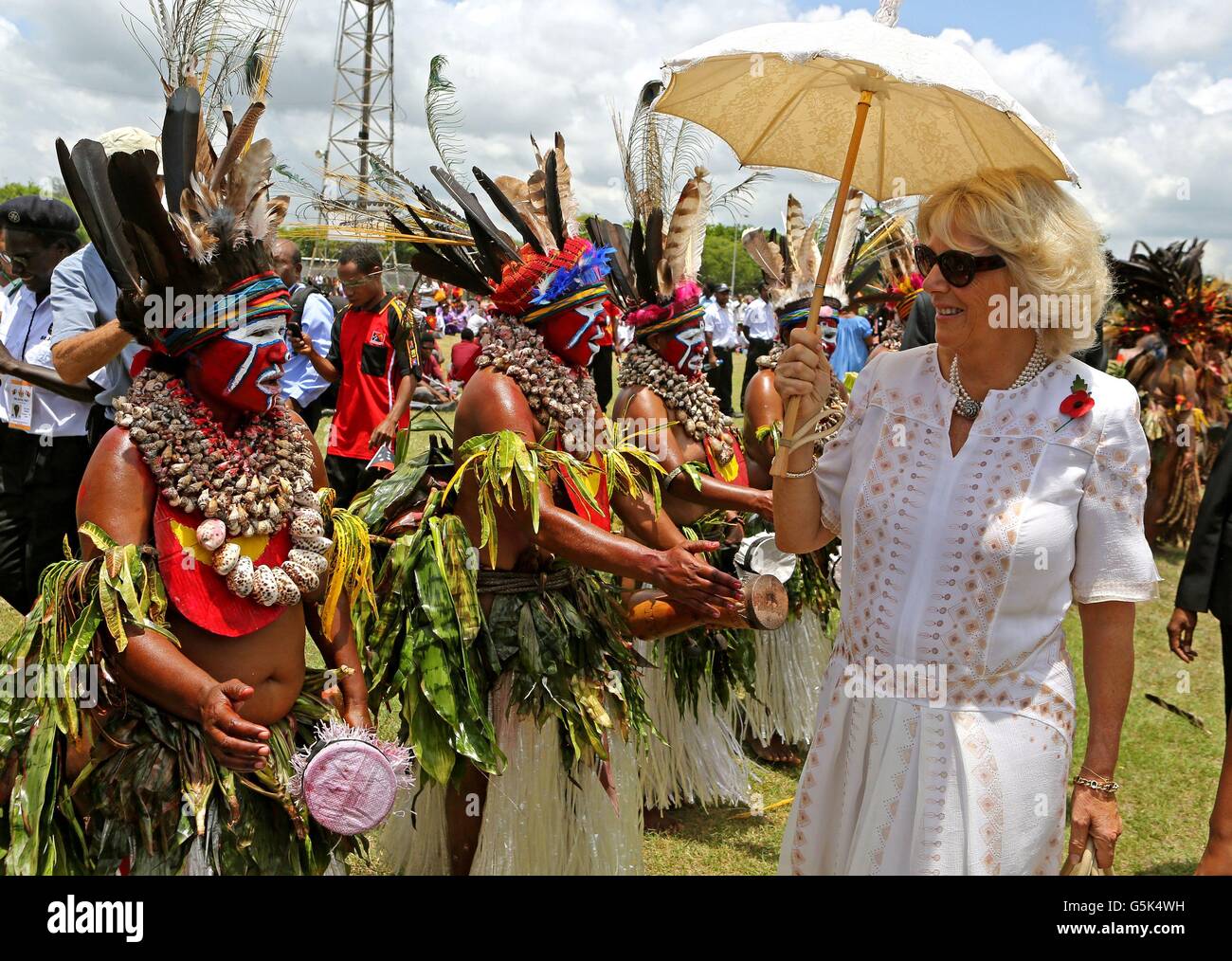 The Duchess of Cornwall meets dancers dressed in traditional dress ...