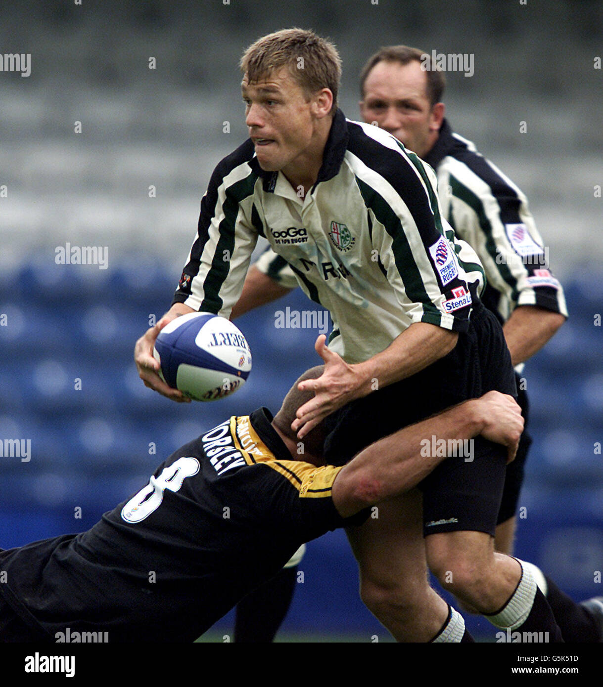 Wasps - Joe Worsley tackles London Irish's - Michael Horak during the ...