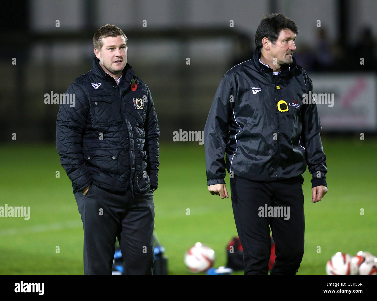 Milton Keynes Dons' first team coach Mick Harford with manager Karl ...
