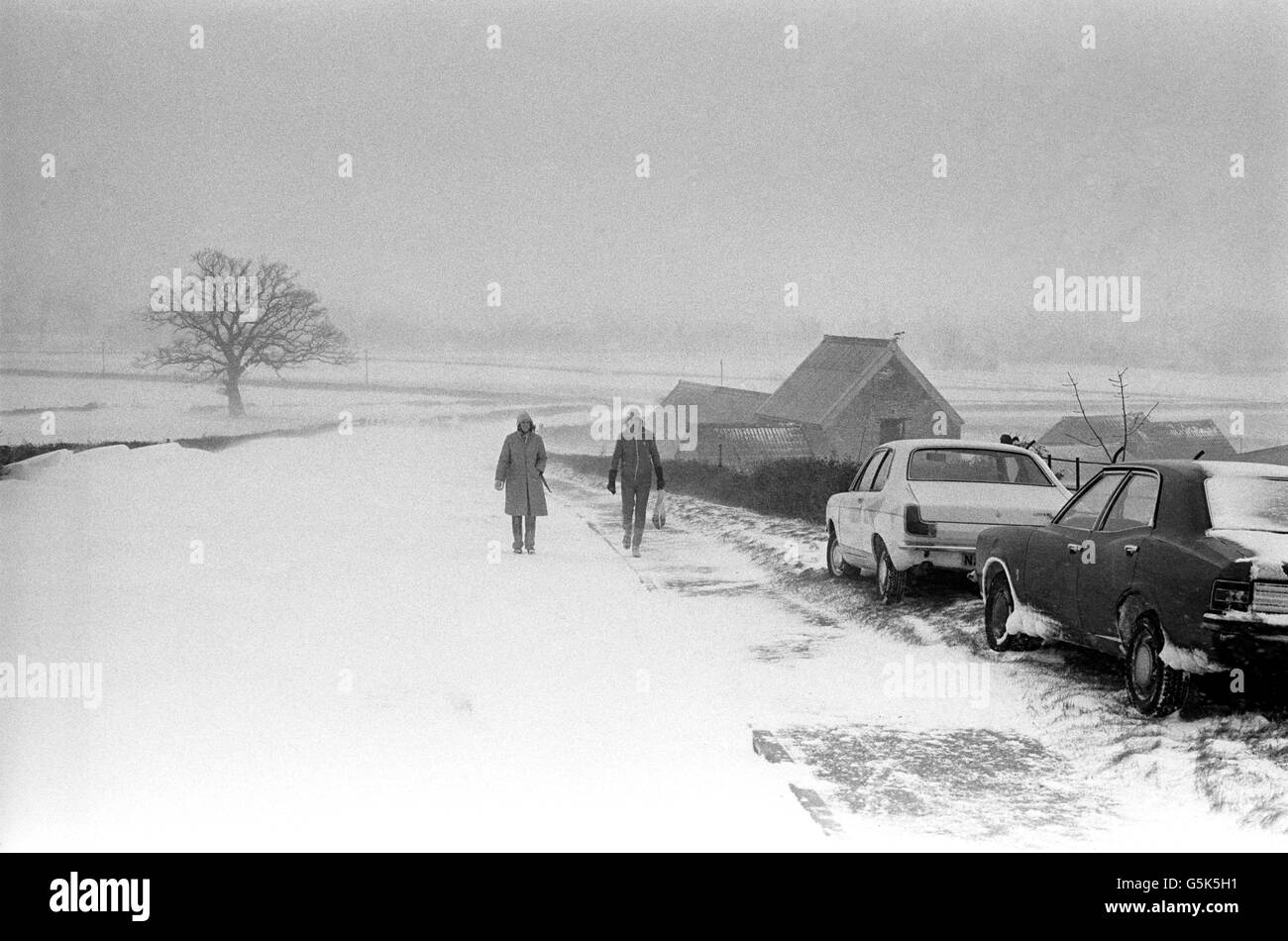 View snow covered road in Black and White Stock Photos & Images - Alamy