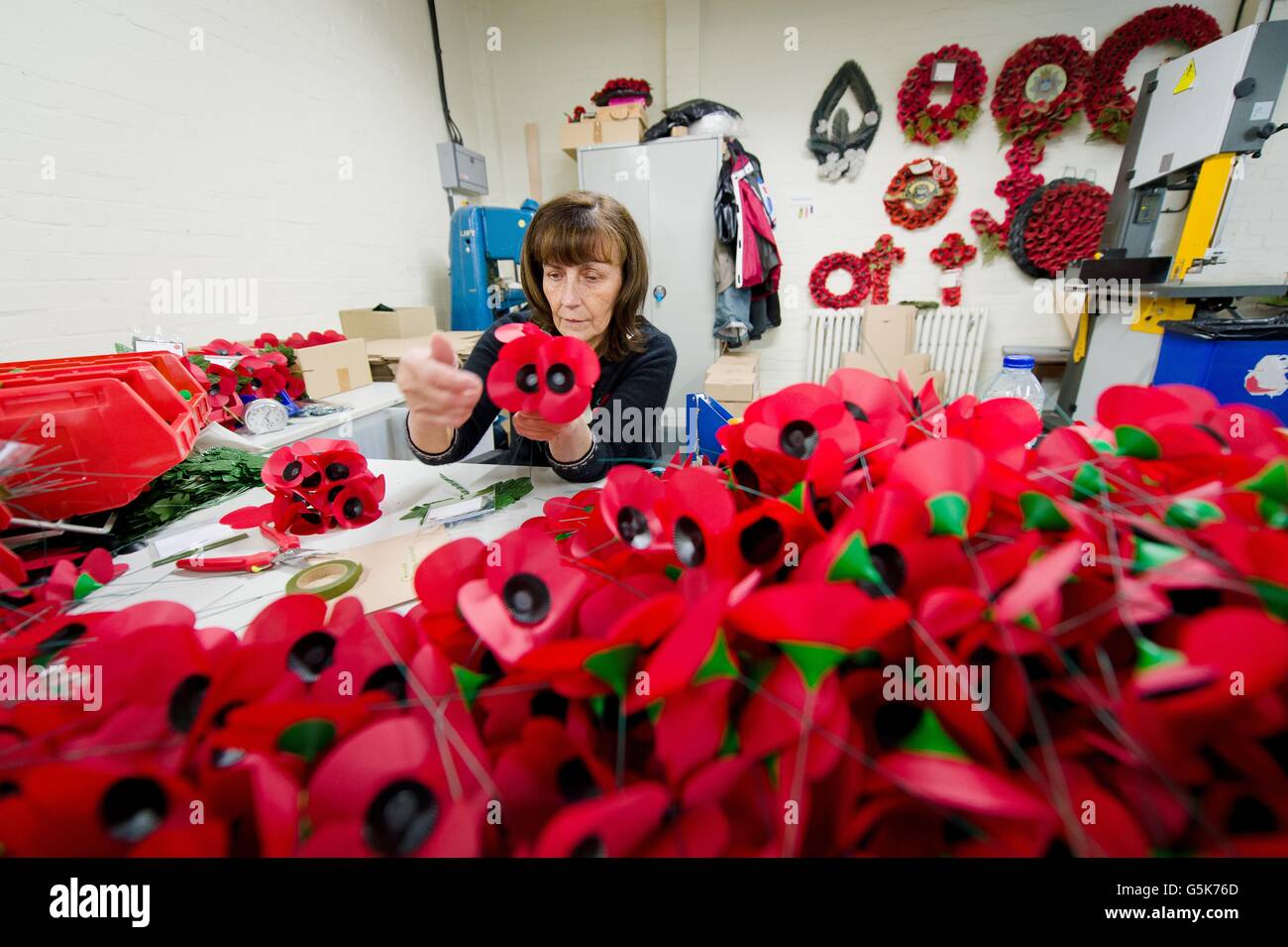 Queen visits Poppy Factory Stock Photo - Alamy