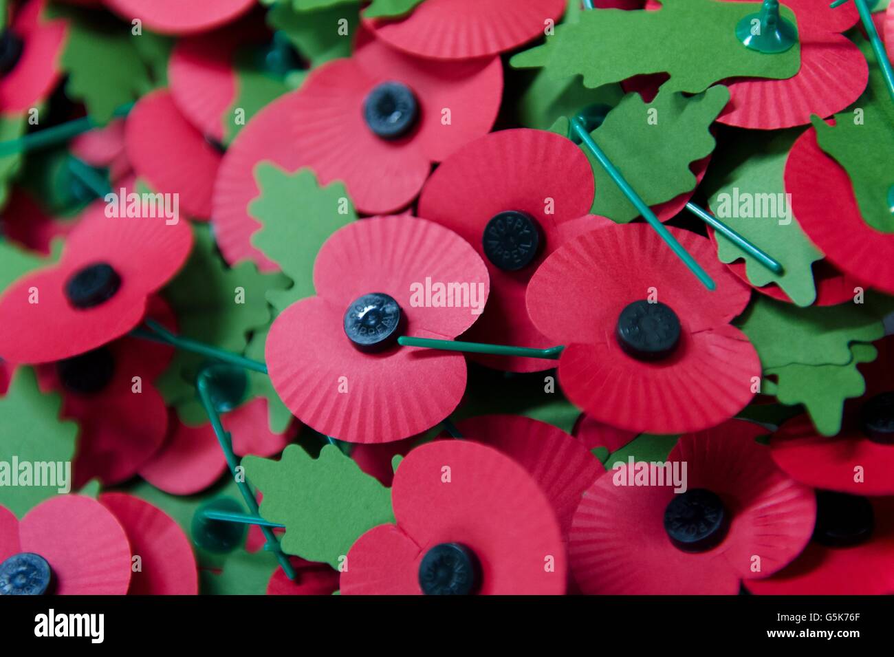 A pile of the iconic red emblem of the British Legion's annual poppy ...