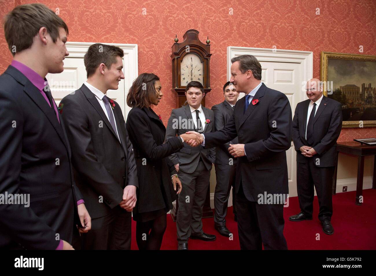Prime Minister David Cameron talks with Microsoft apprentice Cheyenne ...