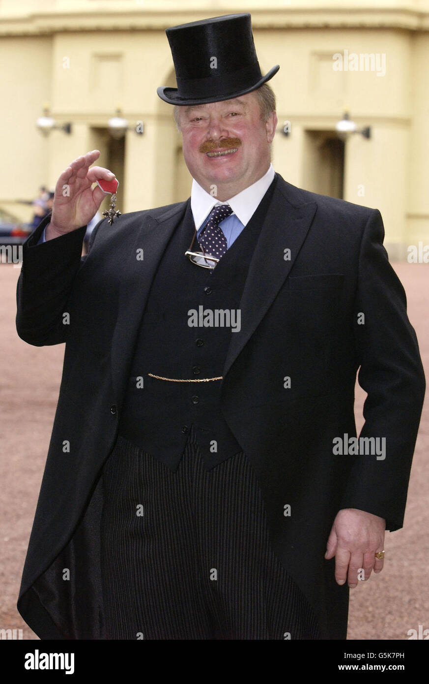 William Poole after an Investiture ceremony at Buckingham Palace in ...