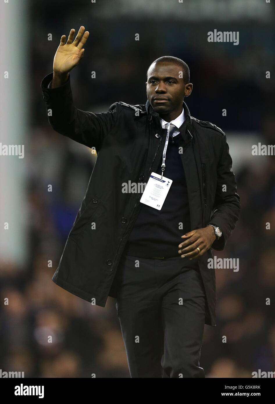 Former footballer Fabrice Muamba waves to the crowd during a parade ...