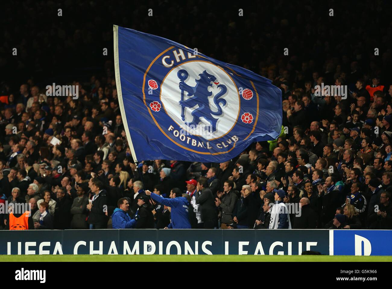 Stamford bridge chelsea fans in the stands wave a flag hi-res stock ...