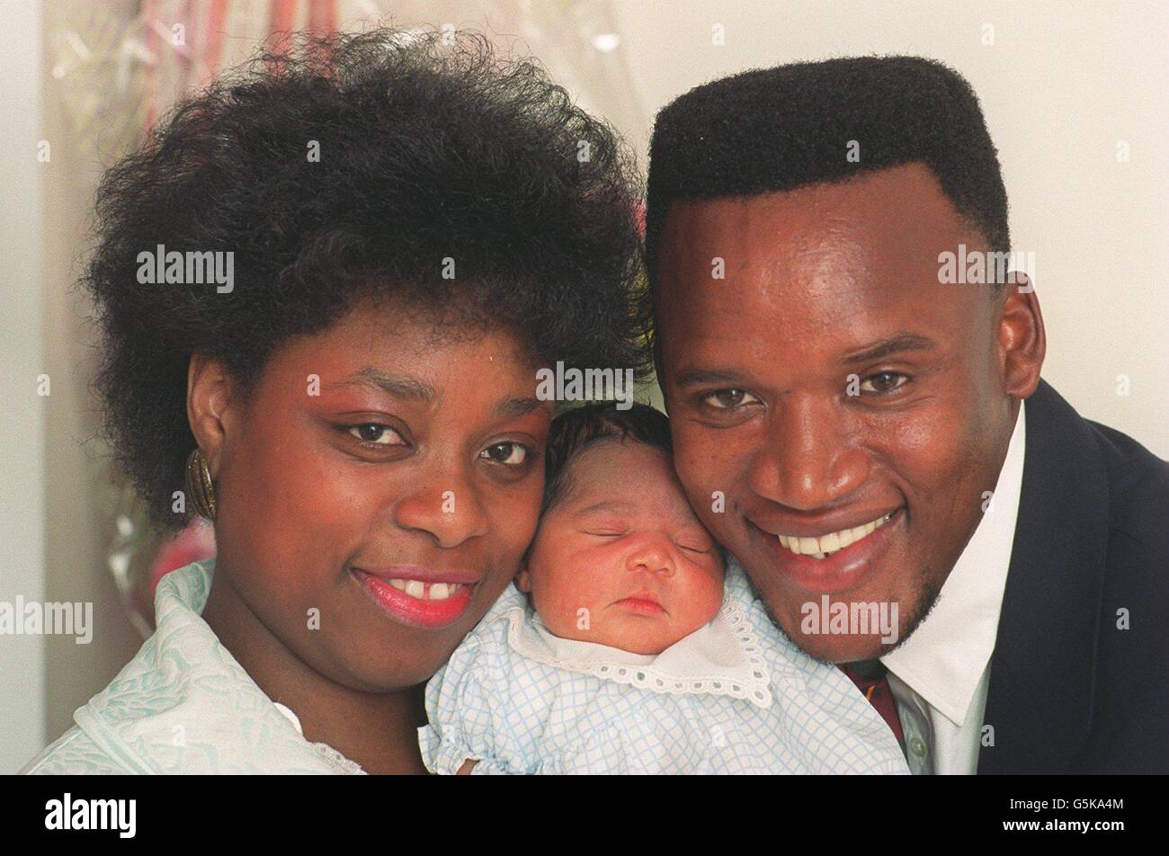 Devon Malcolm wife Jenny and baby Erica Stock Photo - Alamy