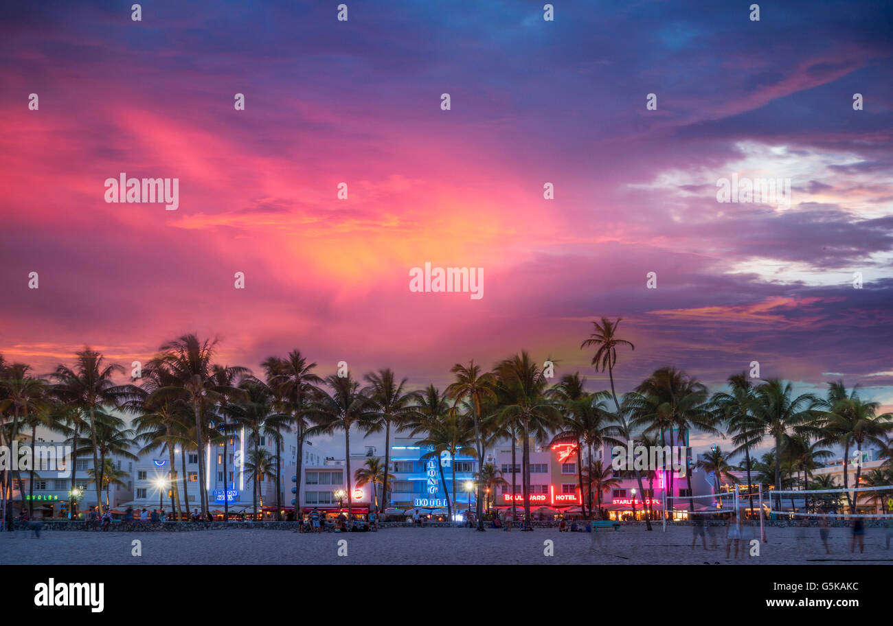 Beachfront buildings under sunset sky Stock Photo - Alamy