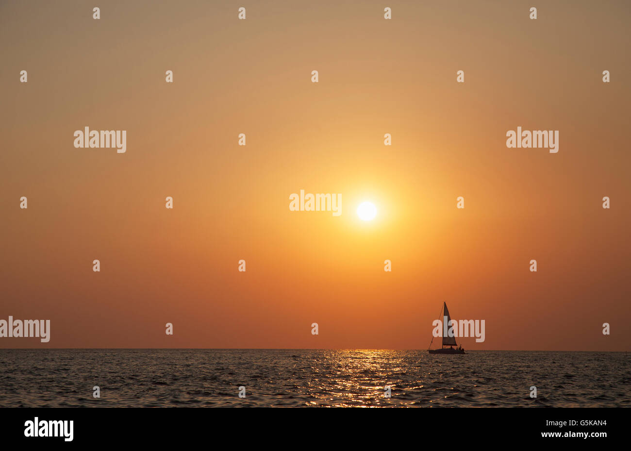 Sailboat sunset in ocean hi-res stock photography and images - Alamy