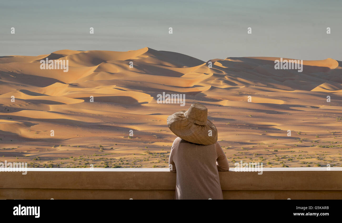 Caucasian woman admiring sand dunes in desert landscape Stock Photo - Alamy