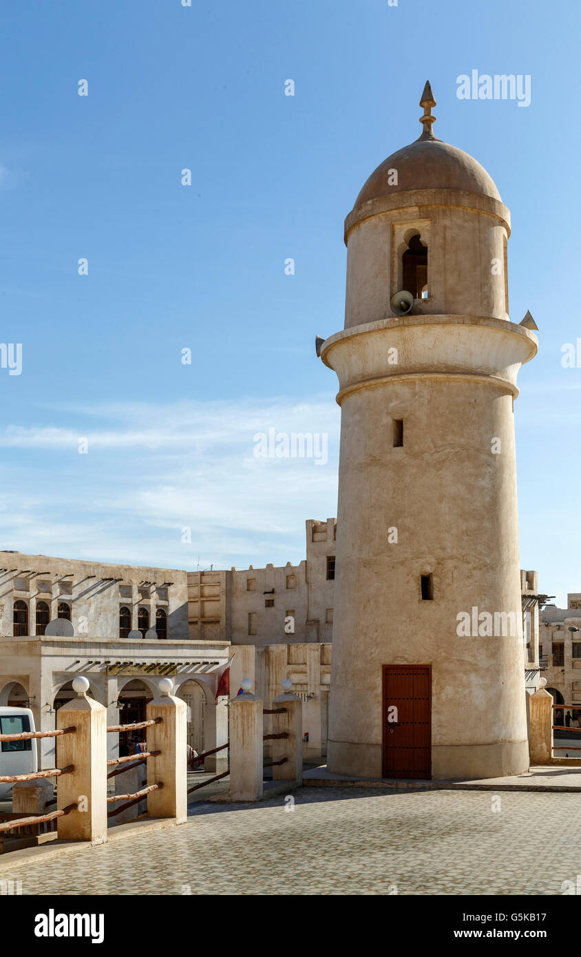 Ornate building and tower under blue sky, Doha, Qatar Stock Photo - Alamy
