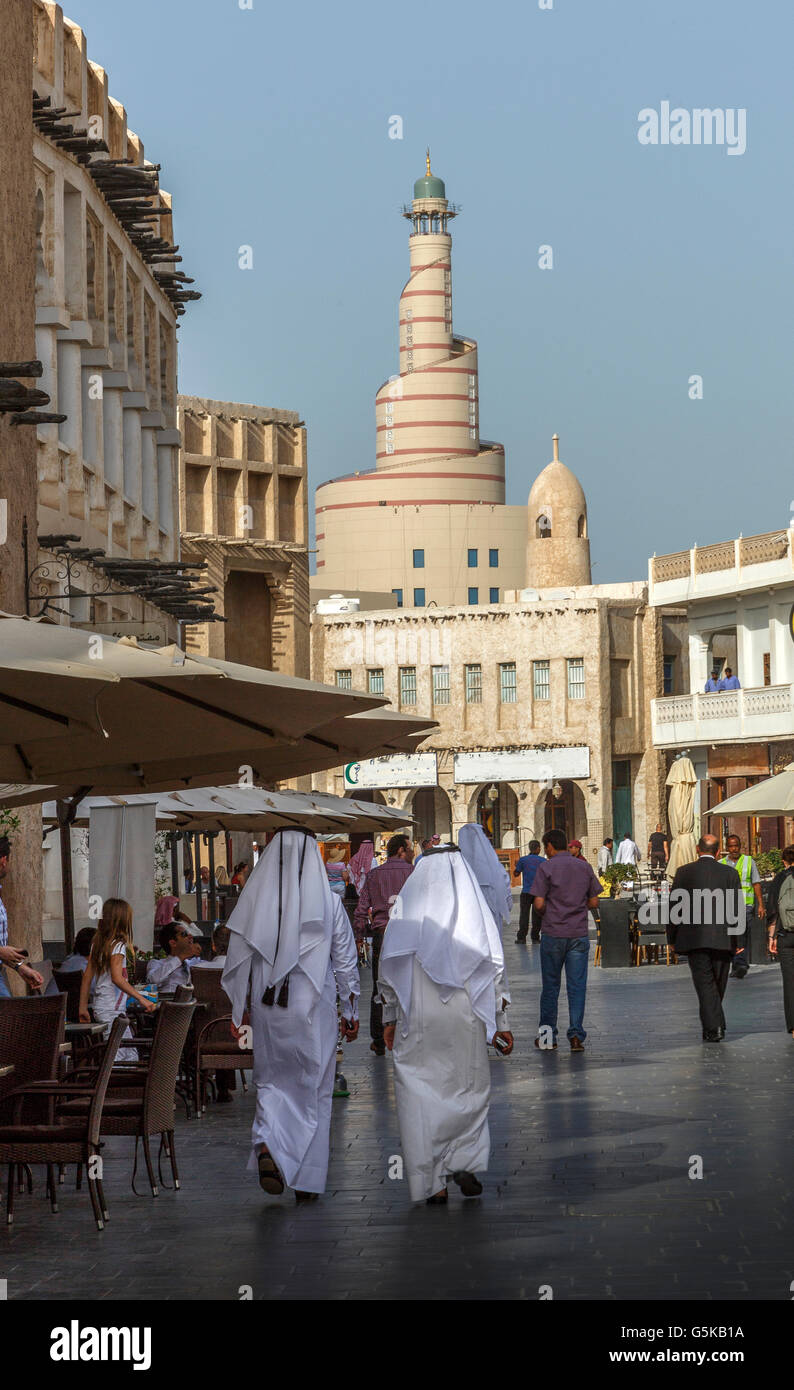 Men walking on Doha street, Doha, Qatar Stock Photo - Alamy