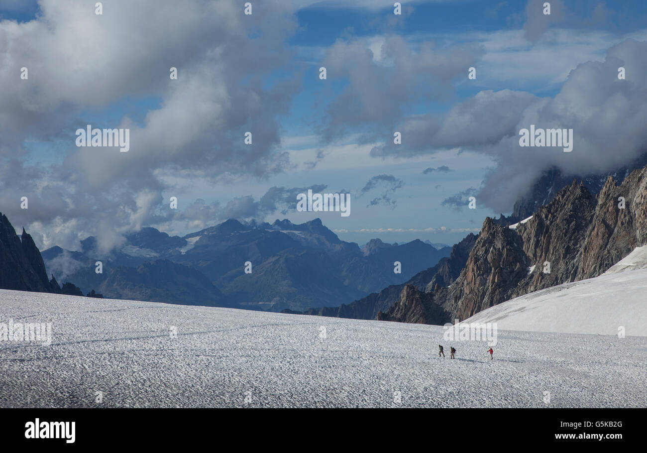 Hikers walking on glacier in remote landscape Stock Photo - Alamy