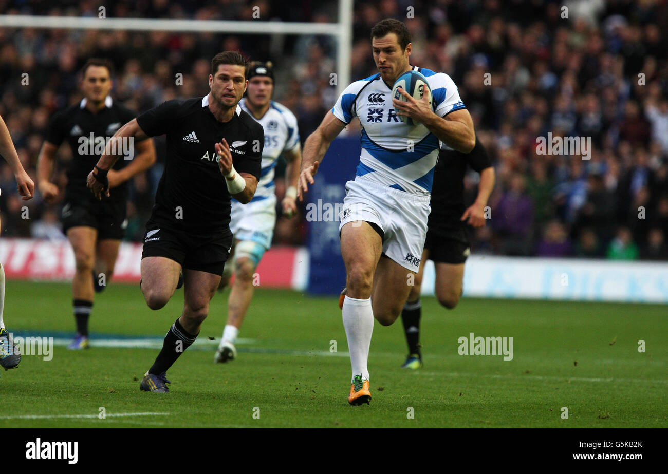 Scotland's Tim Visser runs throught to score a try during the EMC Test ...