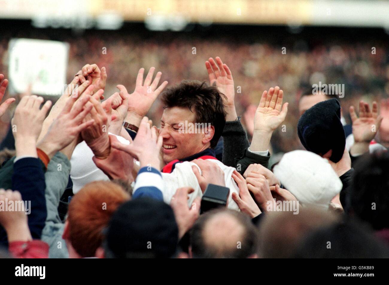 Rob Andrew, England, is mobbed by fans after victory against Scotland ...