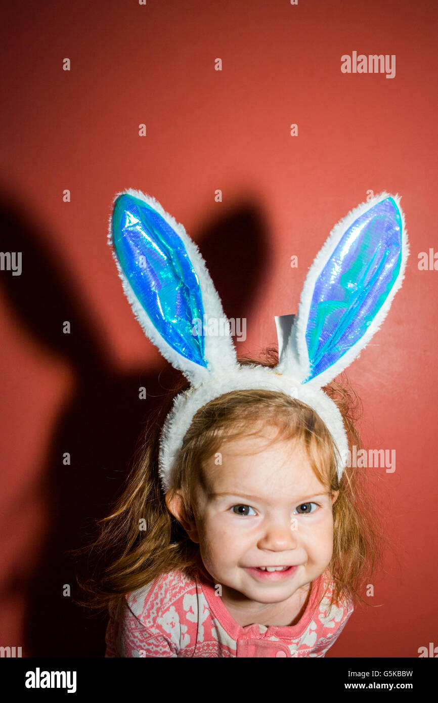 Caucasian baby girl wearing bunny ears Stock Photo - Alamy