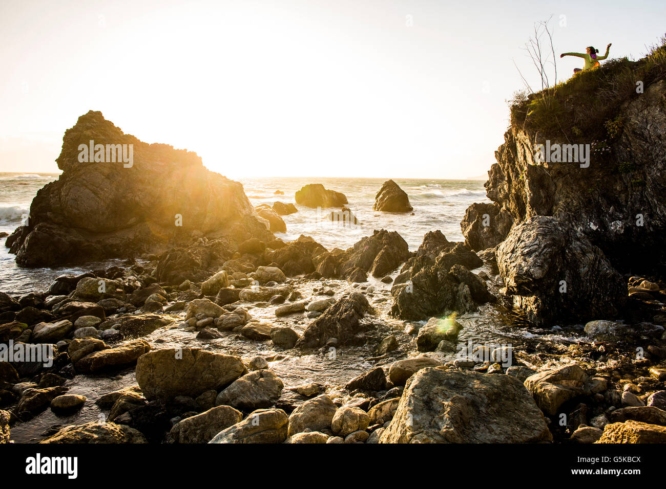 Ocean waves on rocky beach Stock Photo - Alamy