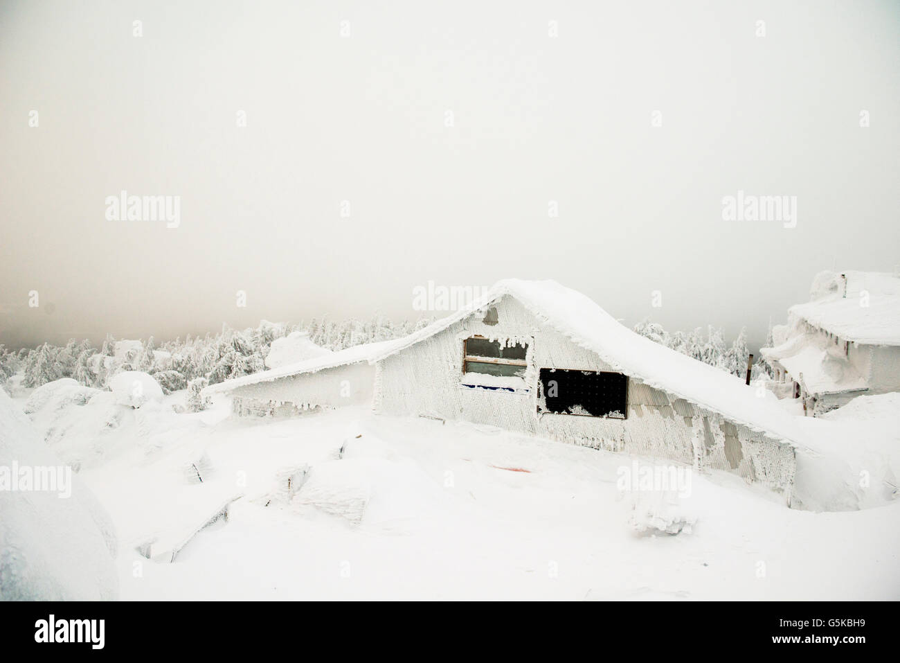 Weather station on snowy remote mountain Stock Photo - Alamy