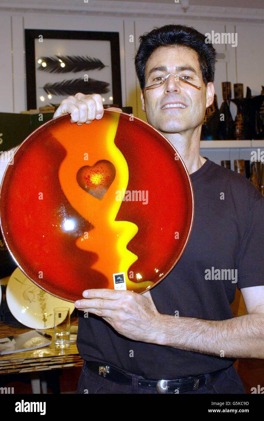 Spoon bender hi-res stock photography and images - Alamy