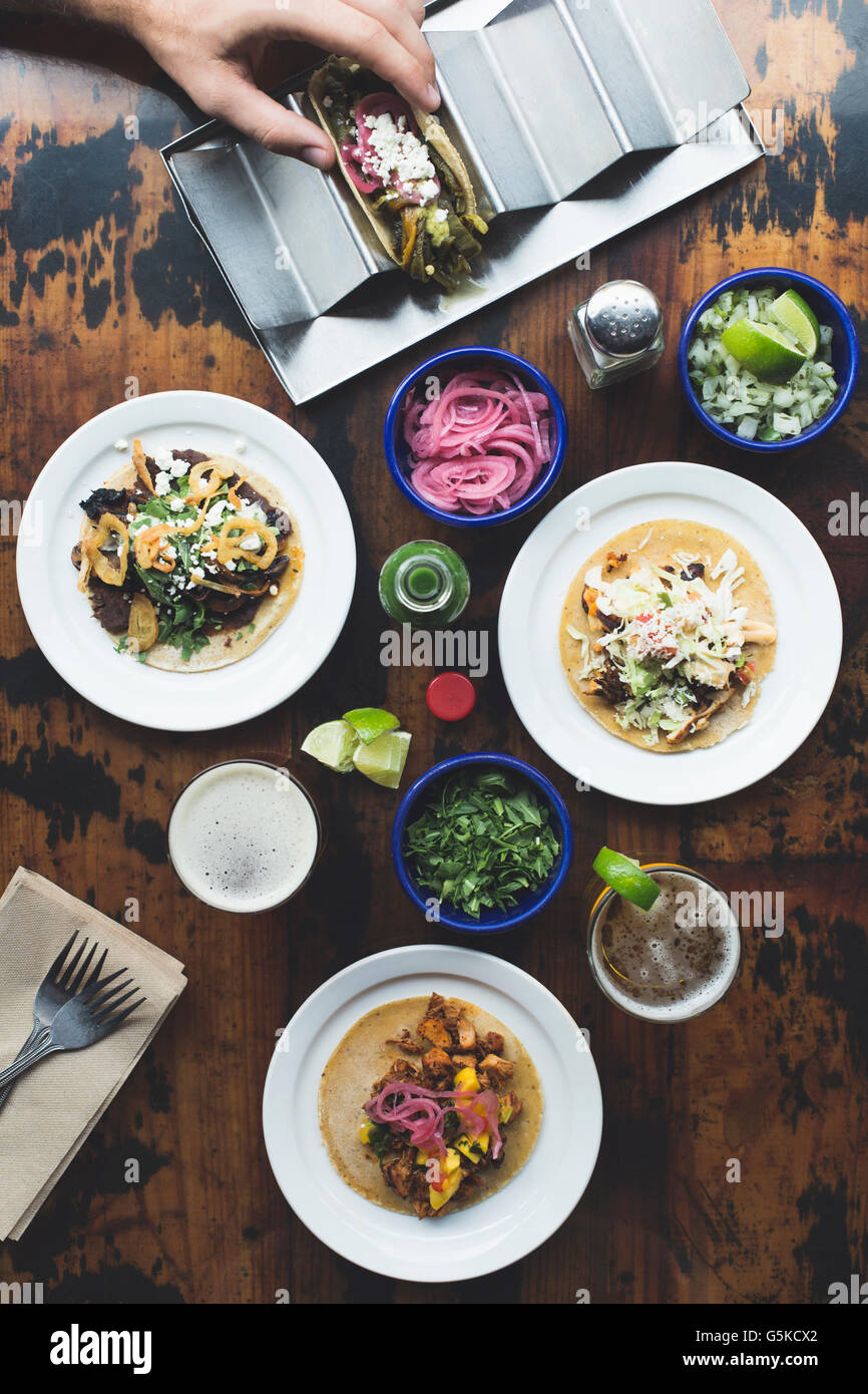 Man eating taco and guacamole hi-res stock photography and images - Alamy