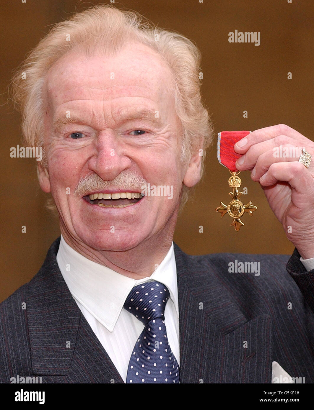 Guitar player Bert Weedon OBE with his honours after receiving them ...