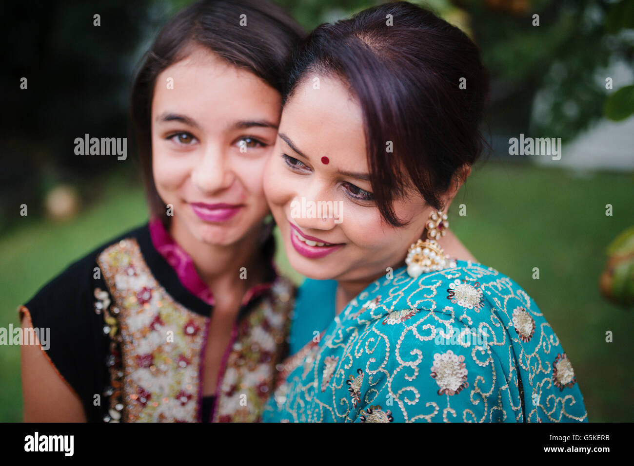 Indian daughter hugging mother hi-res stock photography and images - Alamy